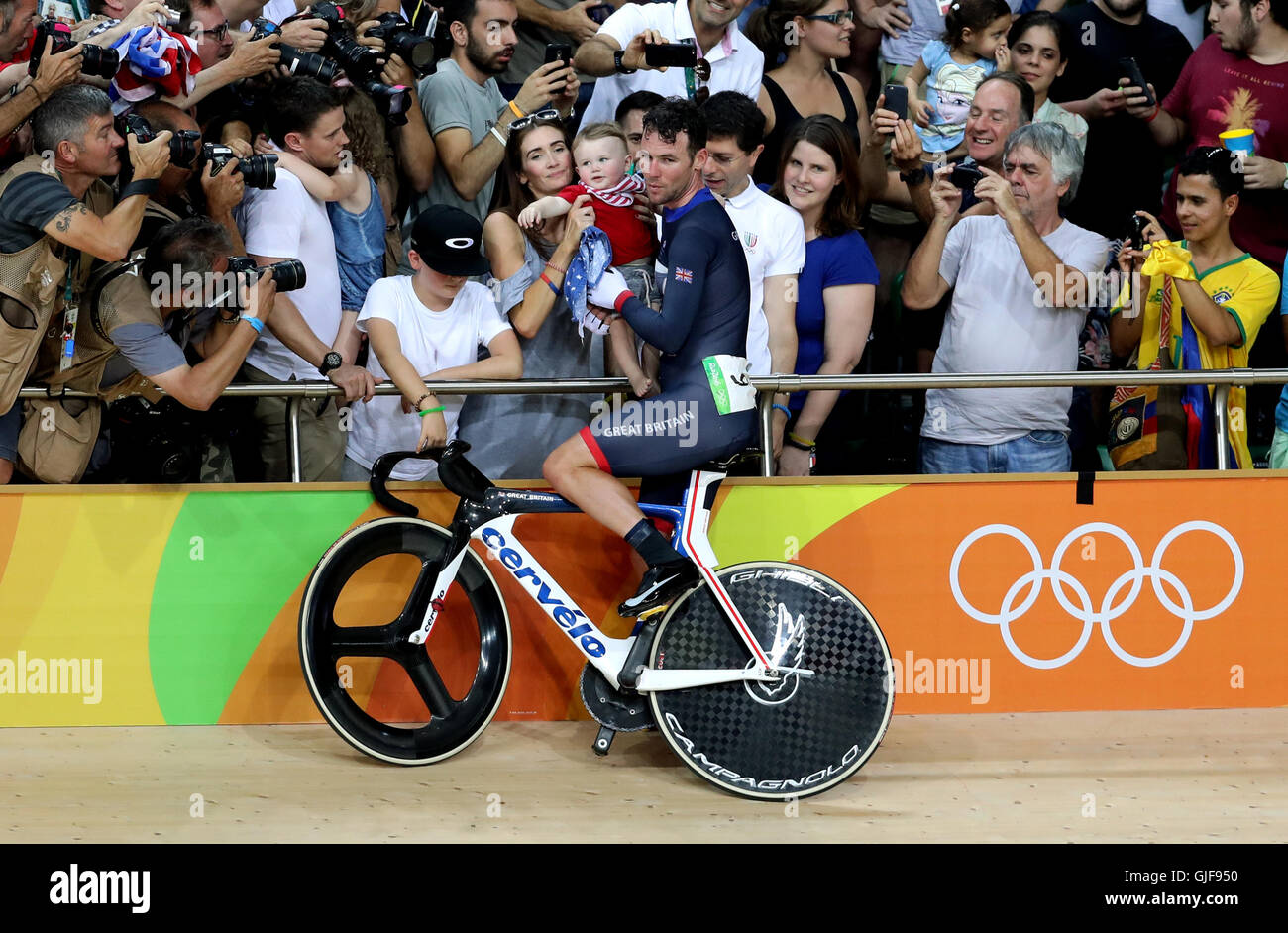 Great Britain's Mark Cavendish with his wife Peta and daughter Frey ...