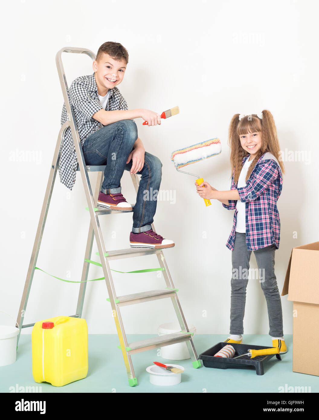 Children makes repairs at home Stock Photo - Alamy