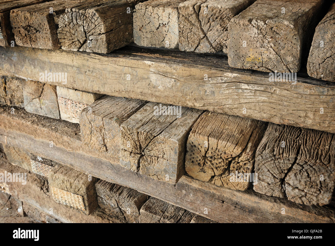 closeup ancient timber stacked, heap of timber Stock Photo - Alamy