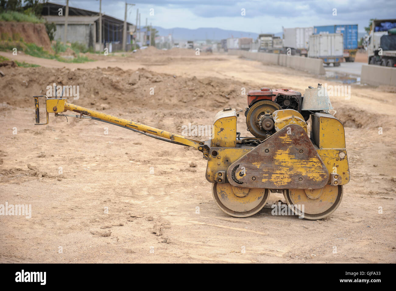 little vibrating roller in construction site Stock Photo - Alamy