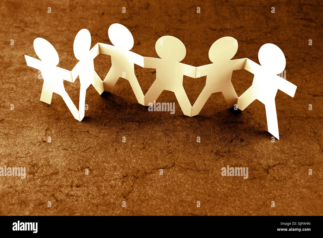 Team of paper doll people Stock Photo - Alamy