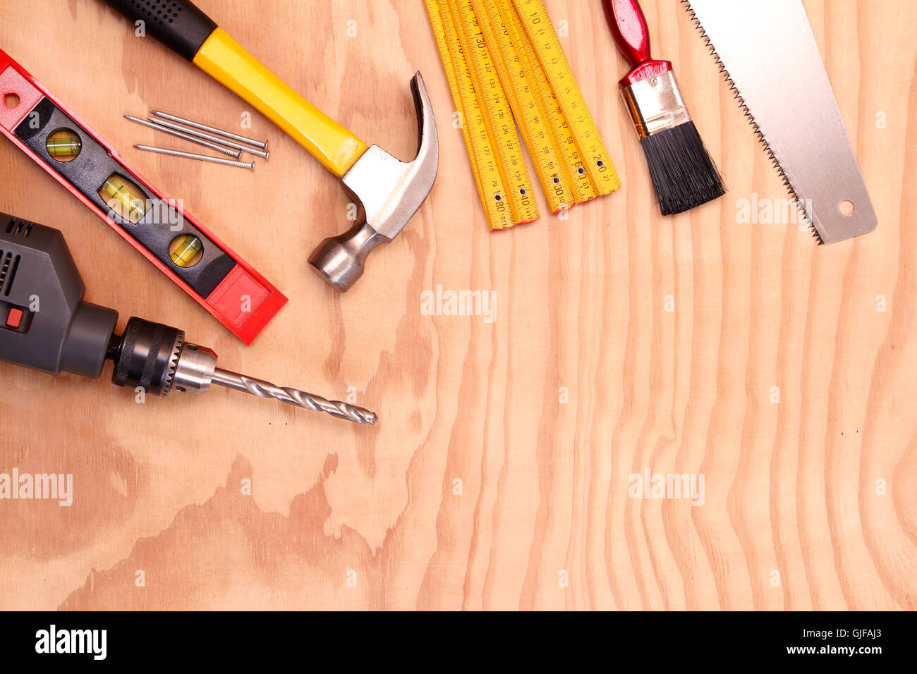 Assorted work tools on wood Stock Photo - Alamy