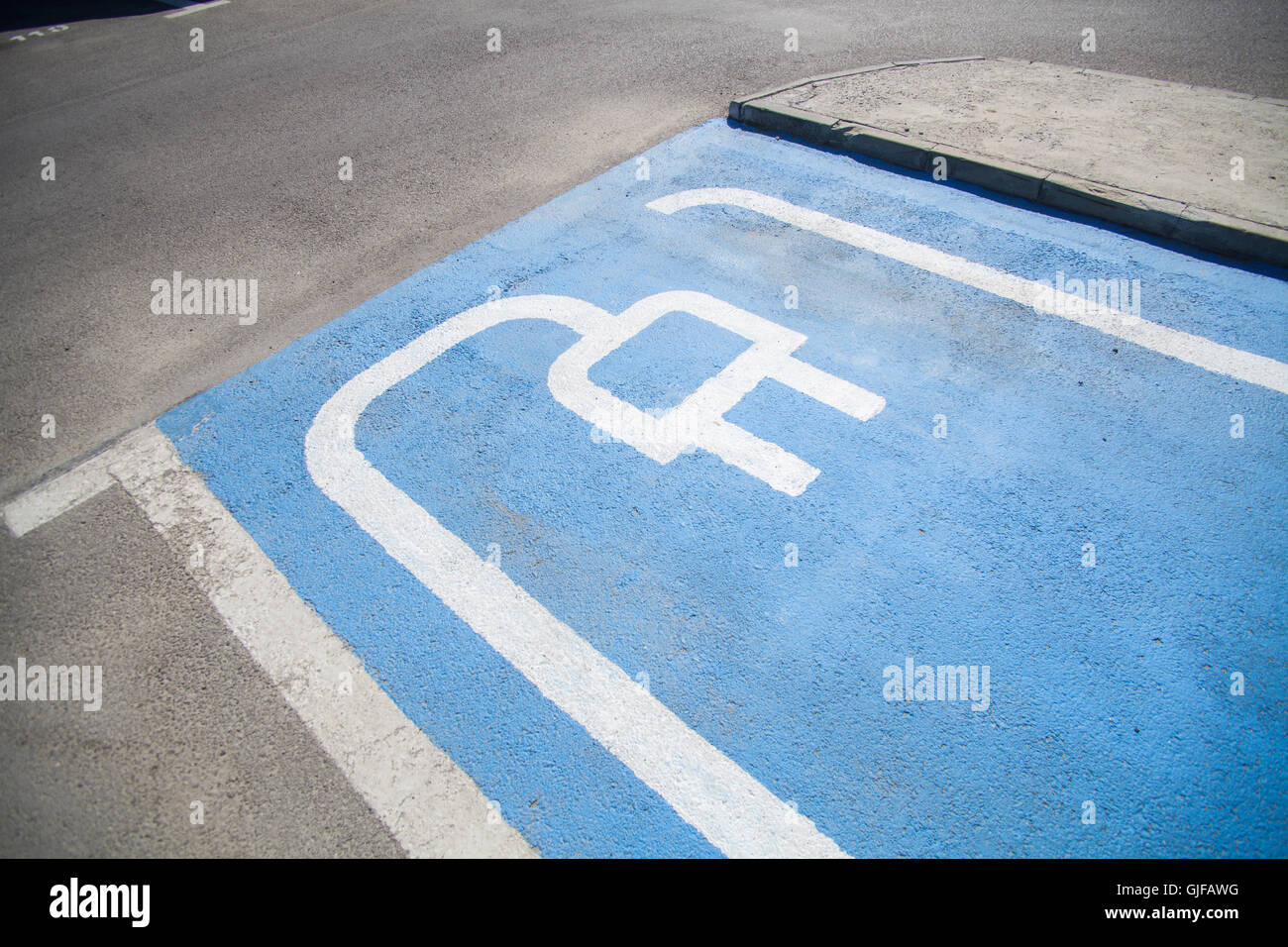 Color image of a parking spot for electric cars Stock Photo - Alamy