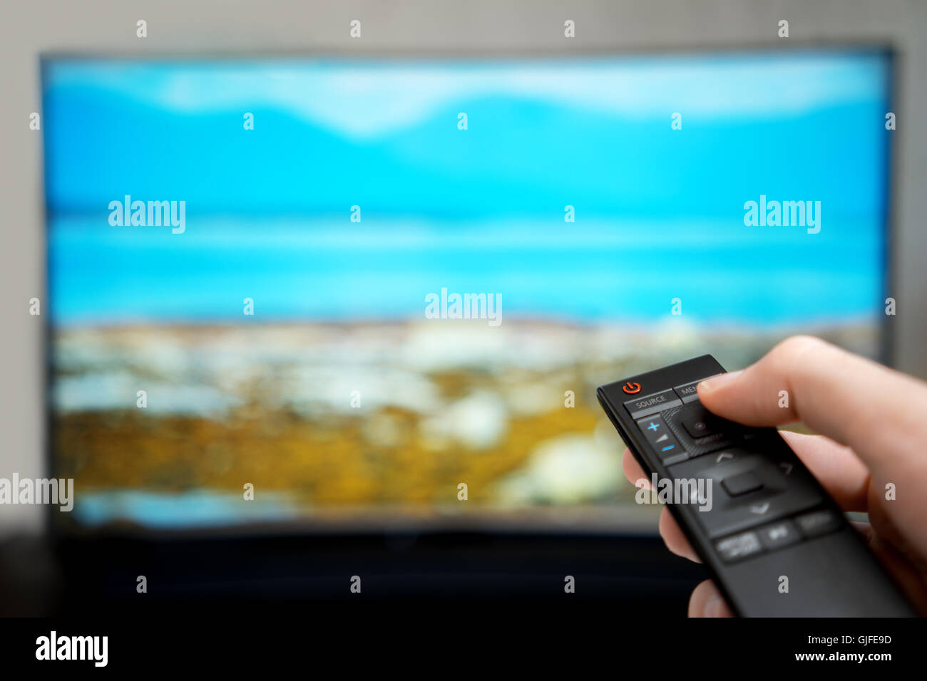 Television remote control changes channels Stock Photo - Alamy