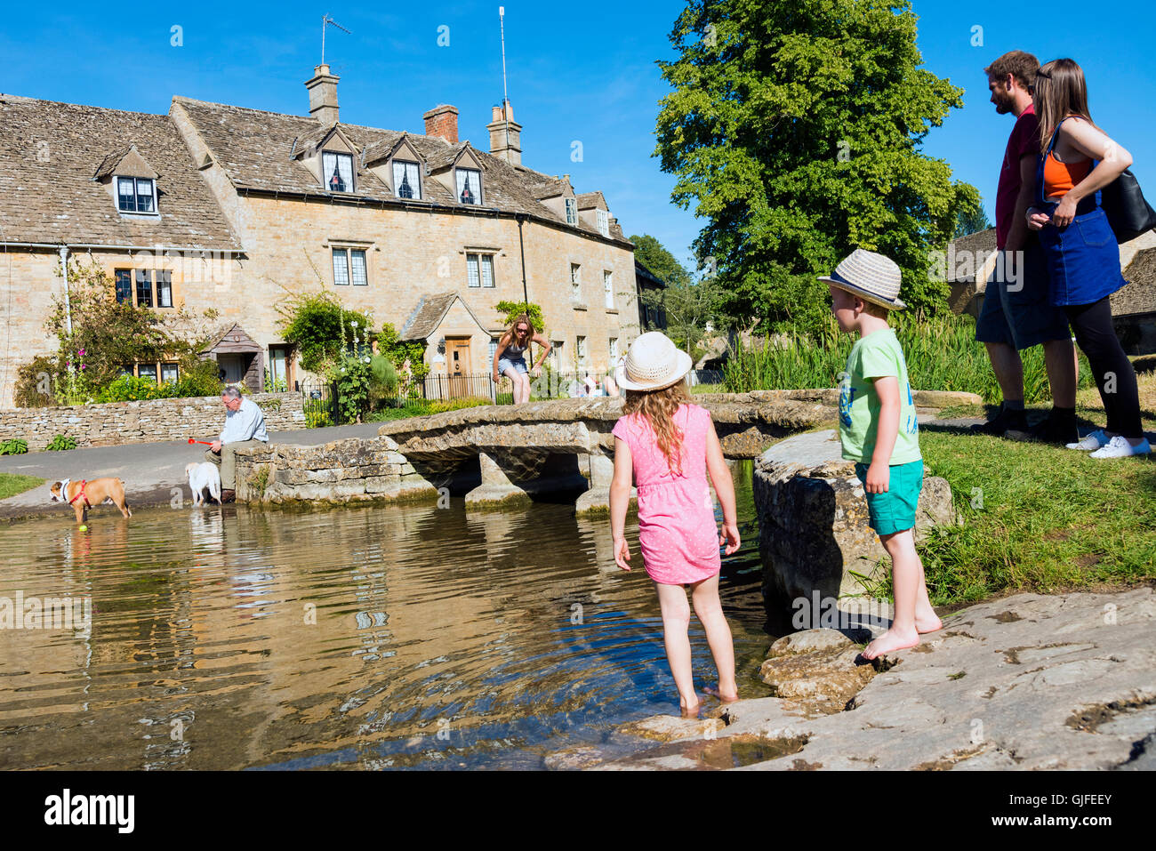 Children playing in river hi-res stock photography and images - Alamy