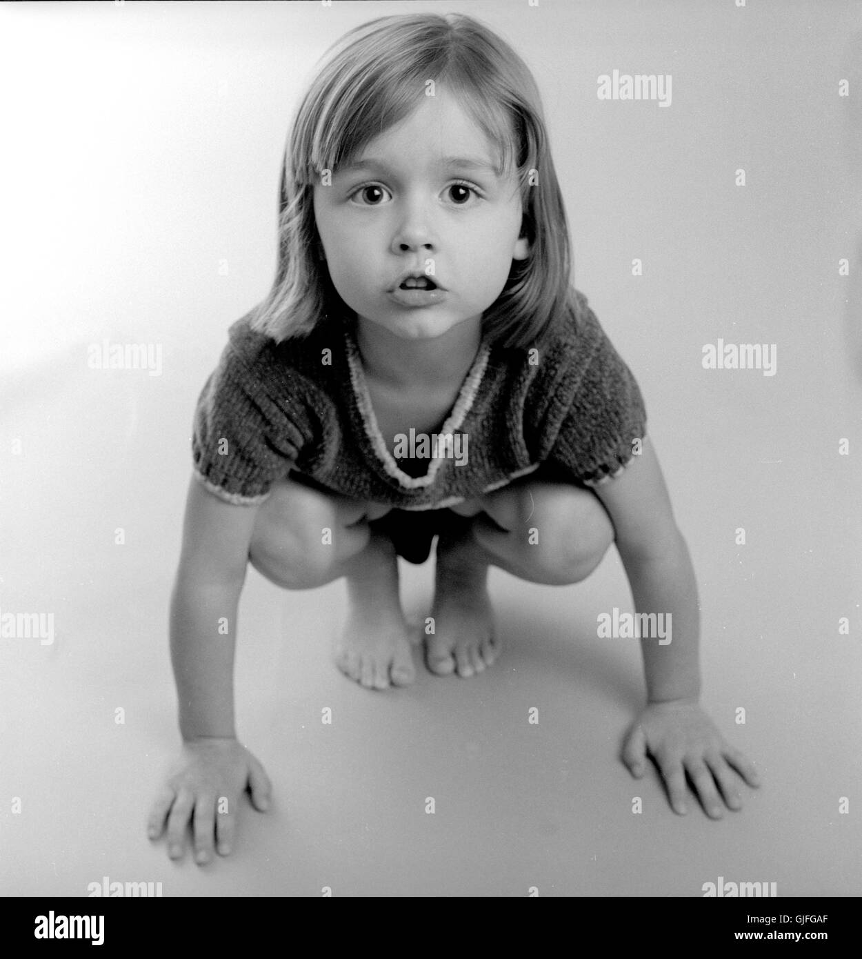 Girl crouch hi-res stock photography and images - Alamy