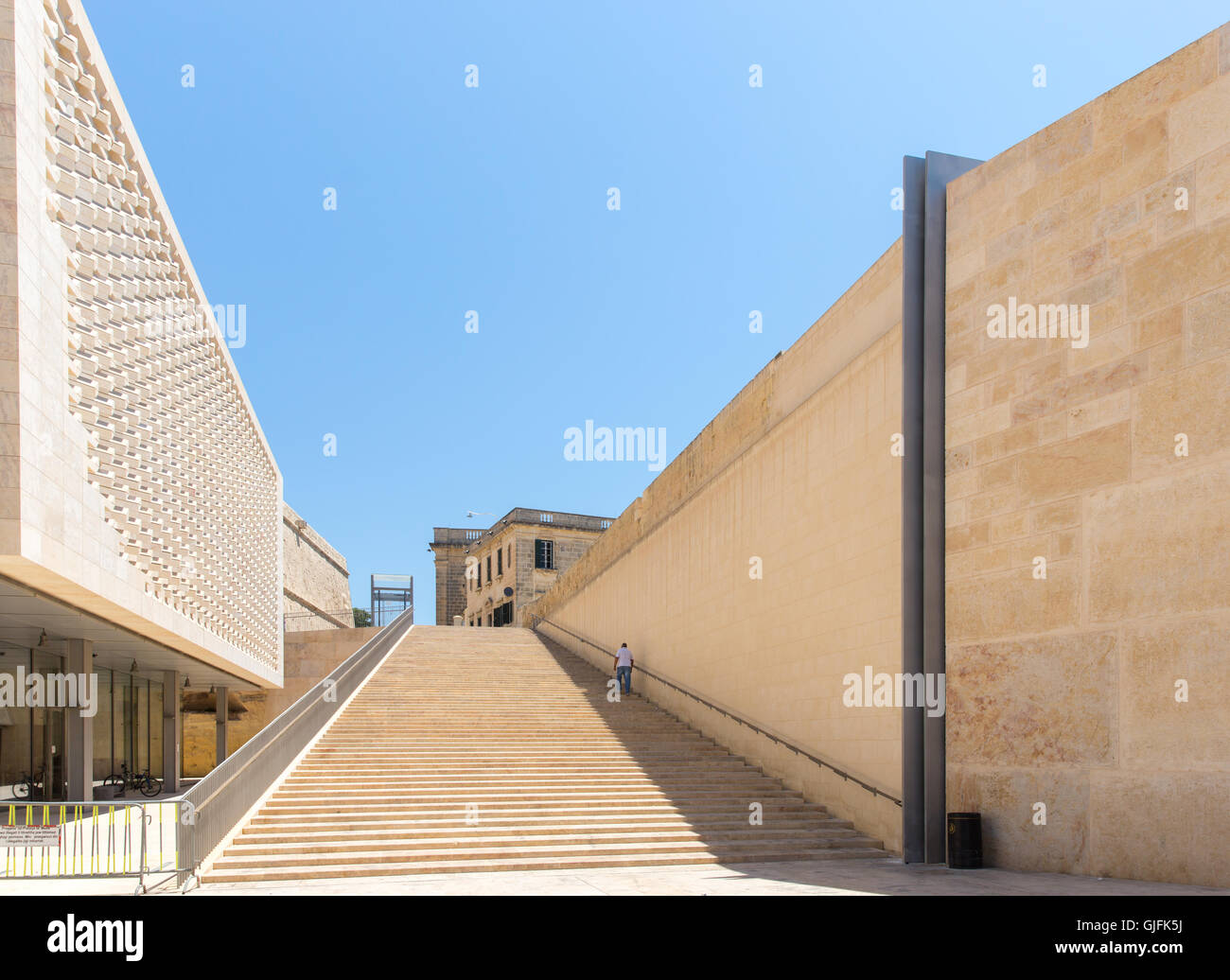 A man walking up newly restored stone steps in Valletta, Malta Stock ...