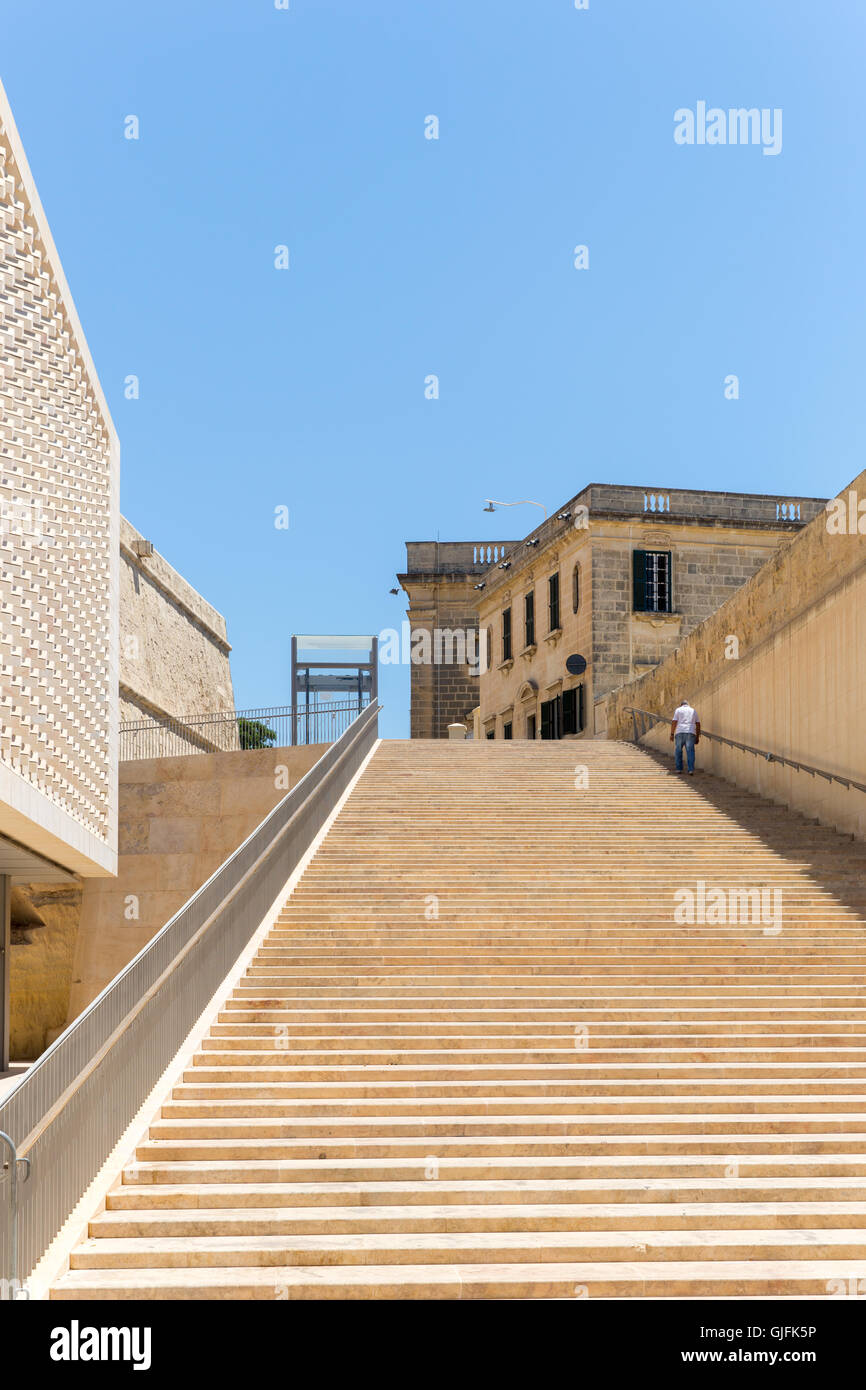 A man walking up newly restored stone steps in Valletta, Malta Stock ...