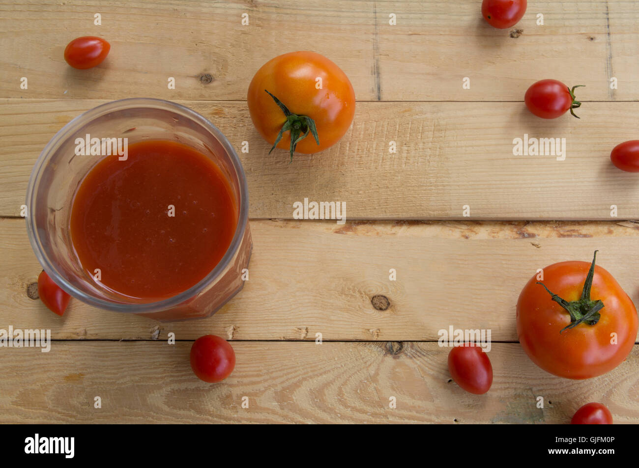 tomatoes tomato glass vegetarian ripe slice Stock Photo - Alamy