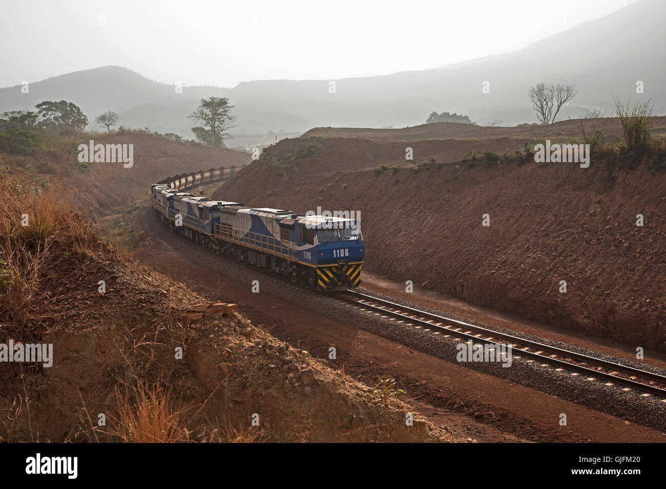 Rail head train operations on iron ore mine. Loaded ore train on new ...