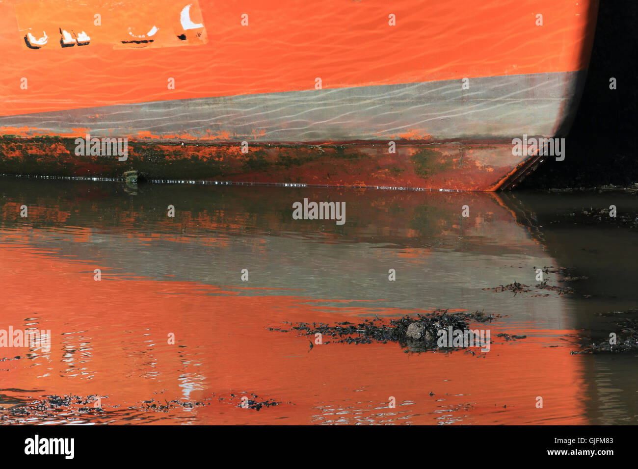 Abstract orange paint on boat hull Stock Photo - Alamy