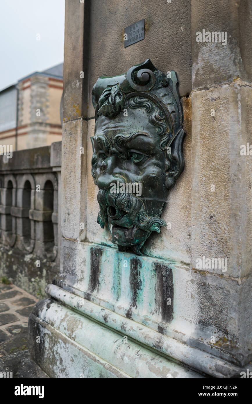 Metalwork face at the castle in Fontainebleau, France Stock Photo - Alamy