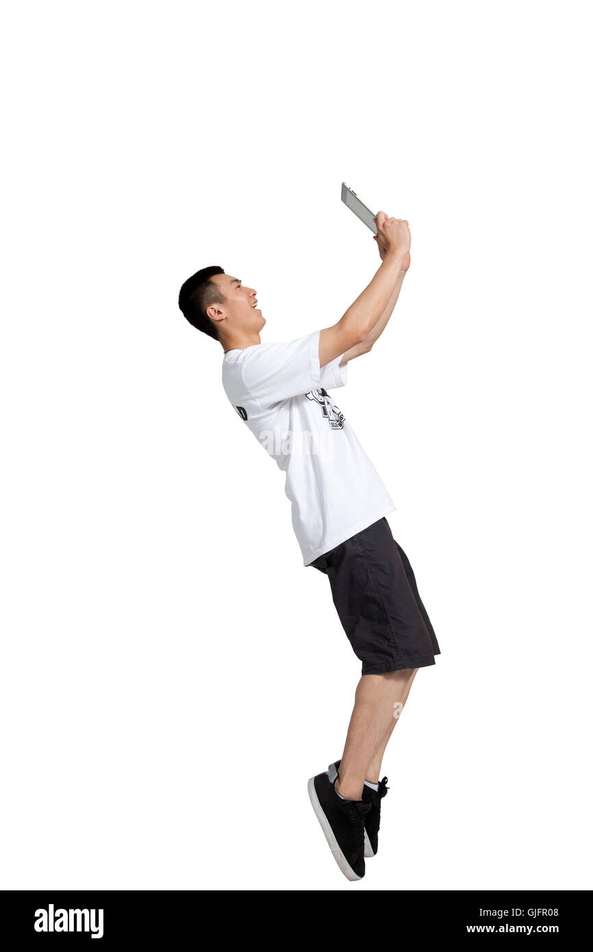 Man woman tablet vertical Cut Out Stock Images & Pictures - Alamy