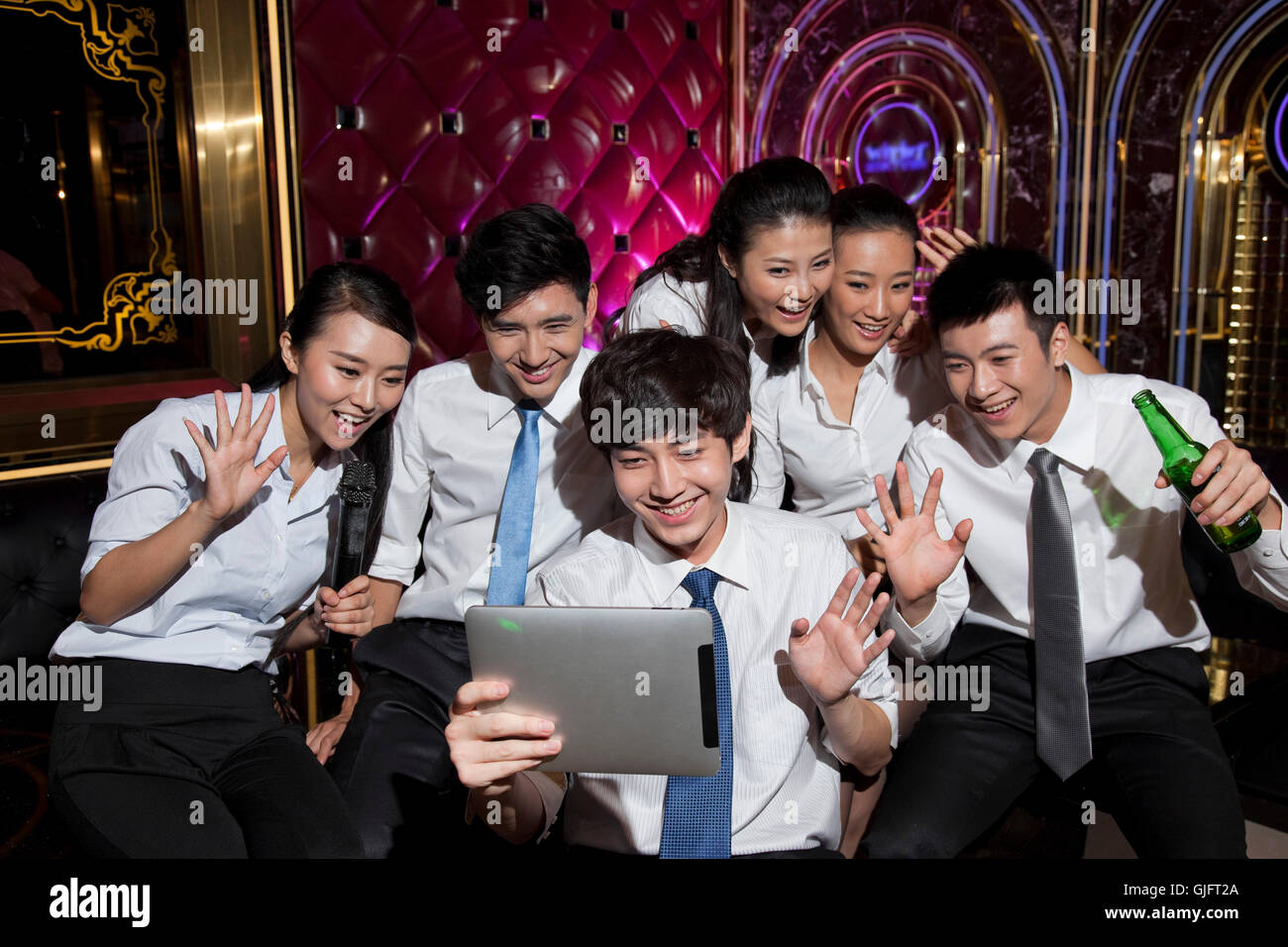 Young woman singing in KTV Stock Photo - Alamy