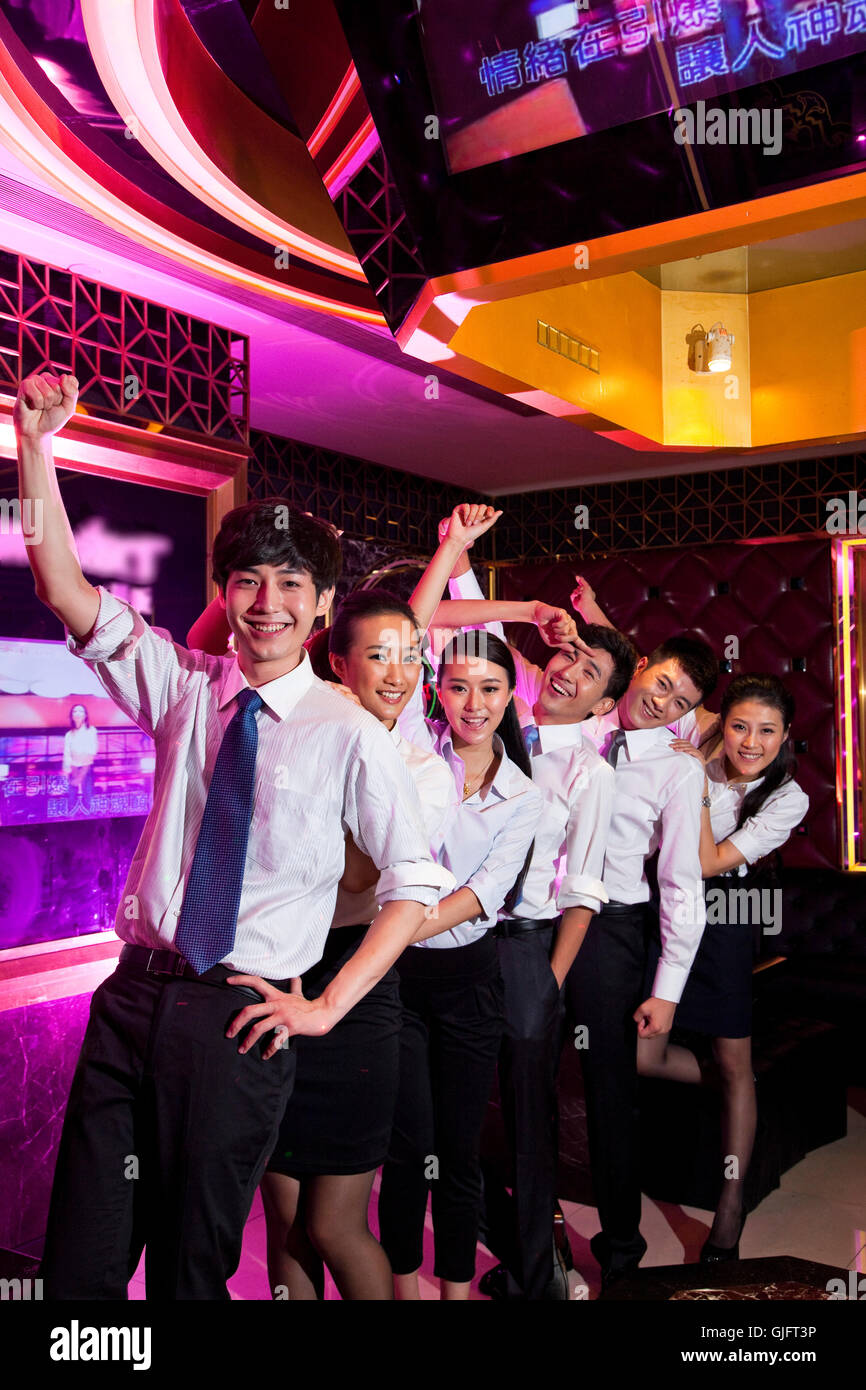 Group of young people gathering in KTV Stock Photo - Alamy