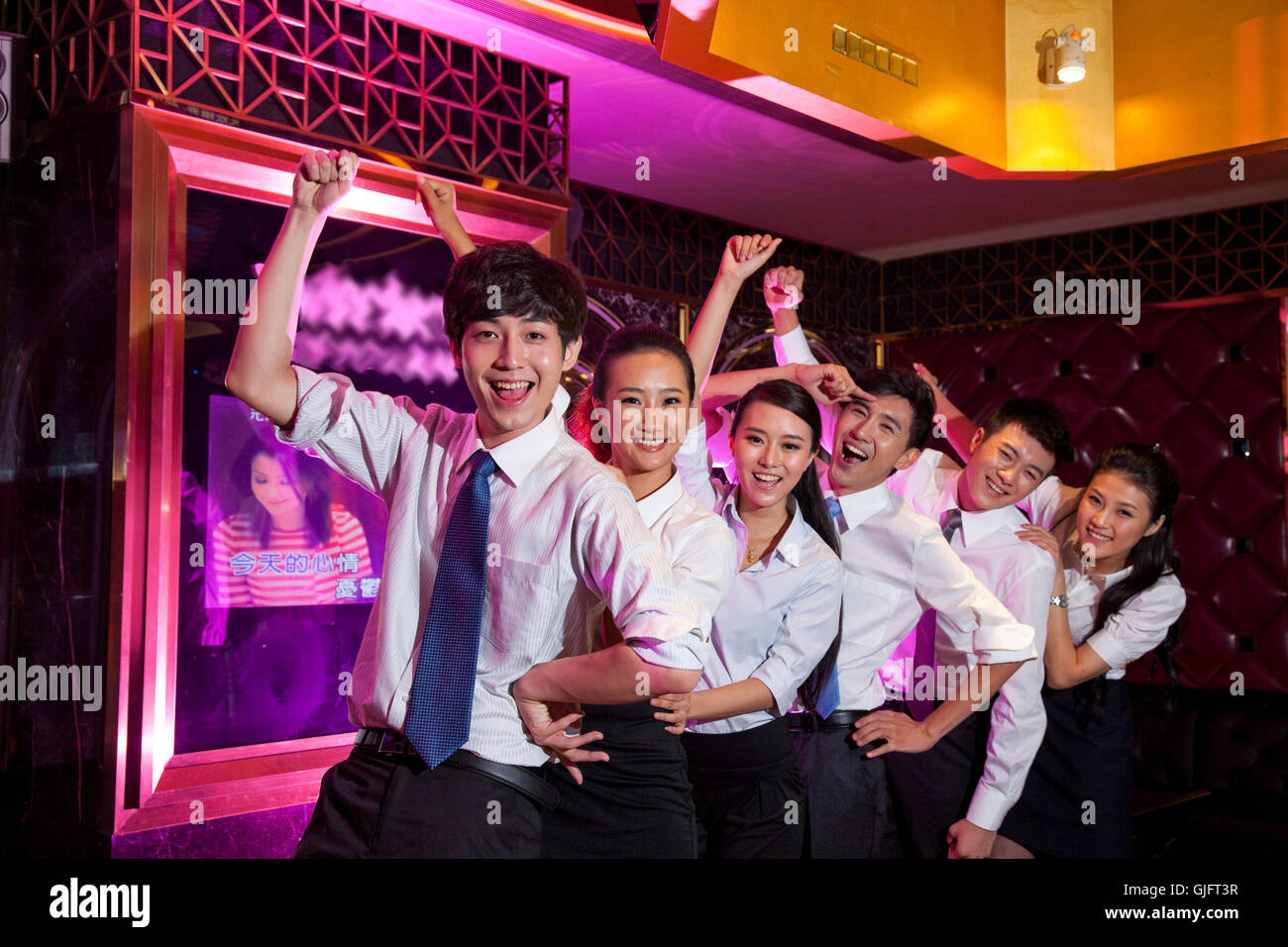 Group of young people gathering in KTV Stock Photo - Alamy