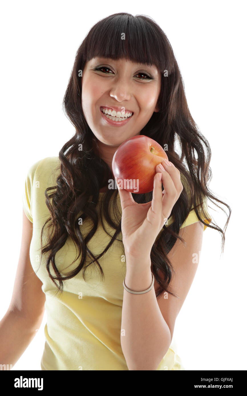 Girl yellow shirt eating apple hi-res stock photography and images - Alamy