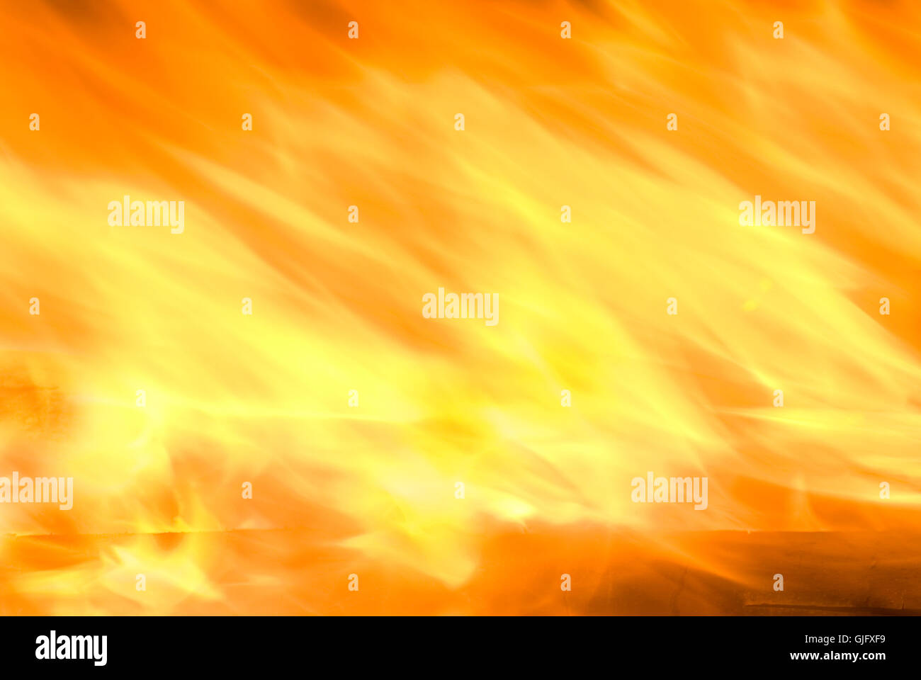 fire is blowing with wind Stock Photo - Alamy