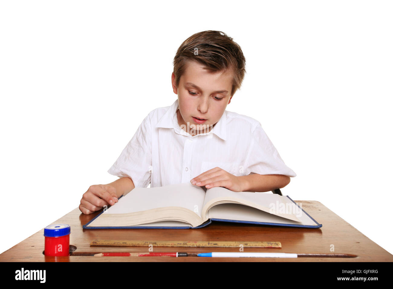 School student reading a book Stock Photo - Alamy