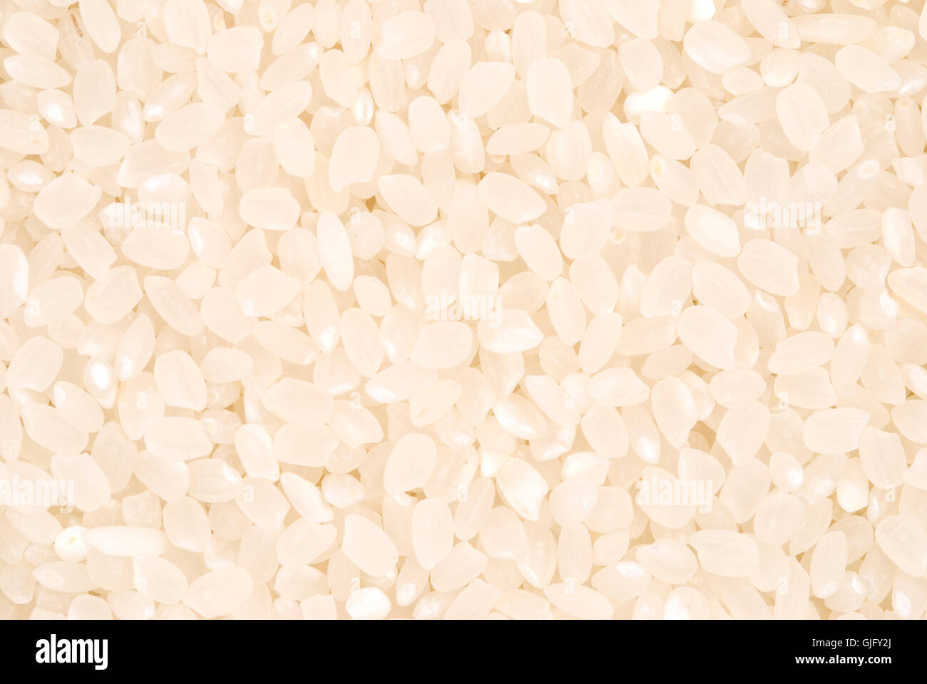 white rice as background Stock Photo - Alamy
