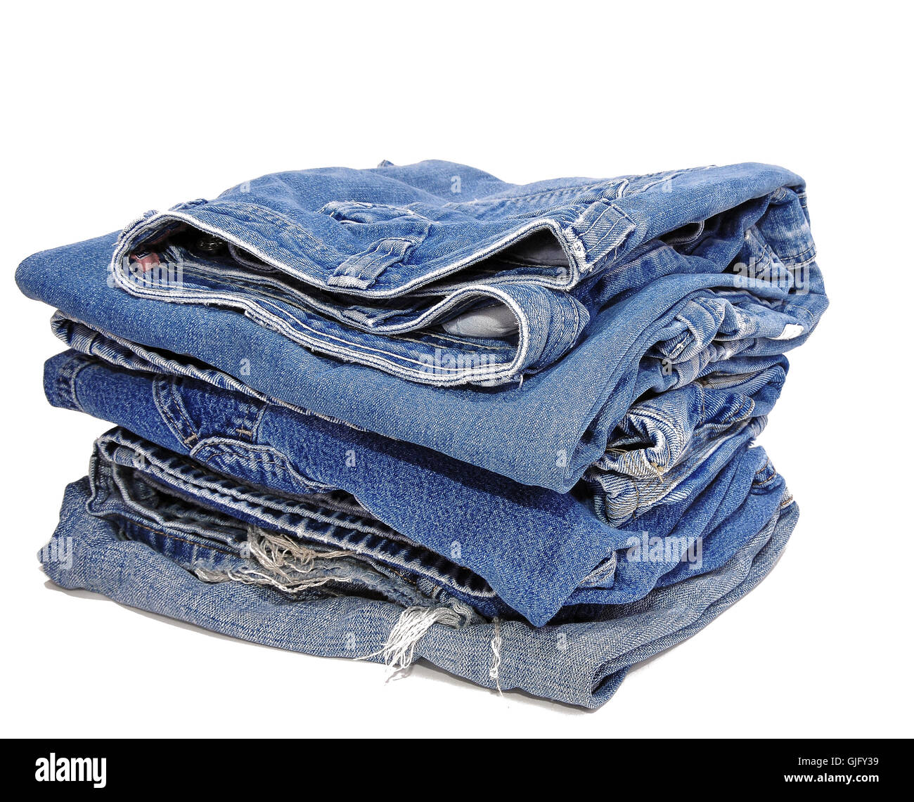 Jeans folded in a neat stack Stock Photo - Alamy