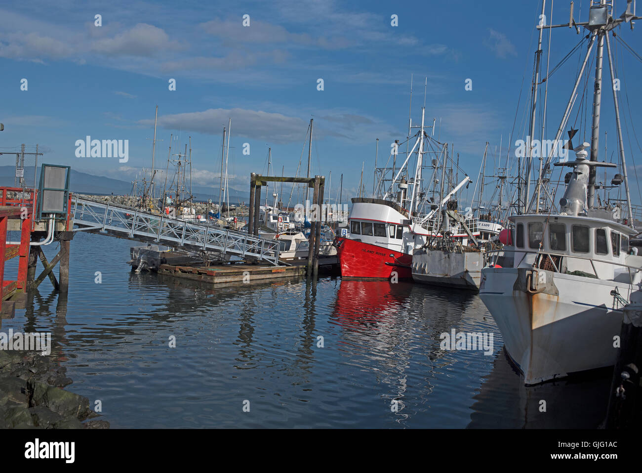 Colourful fishing boats waiting in French creek for the start of the ...