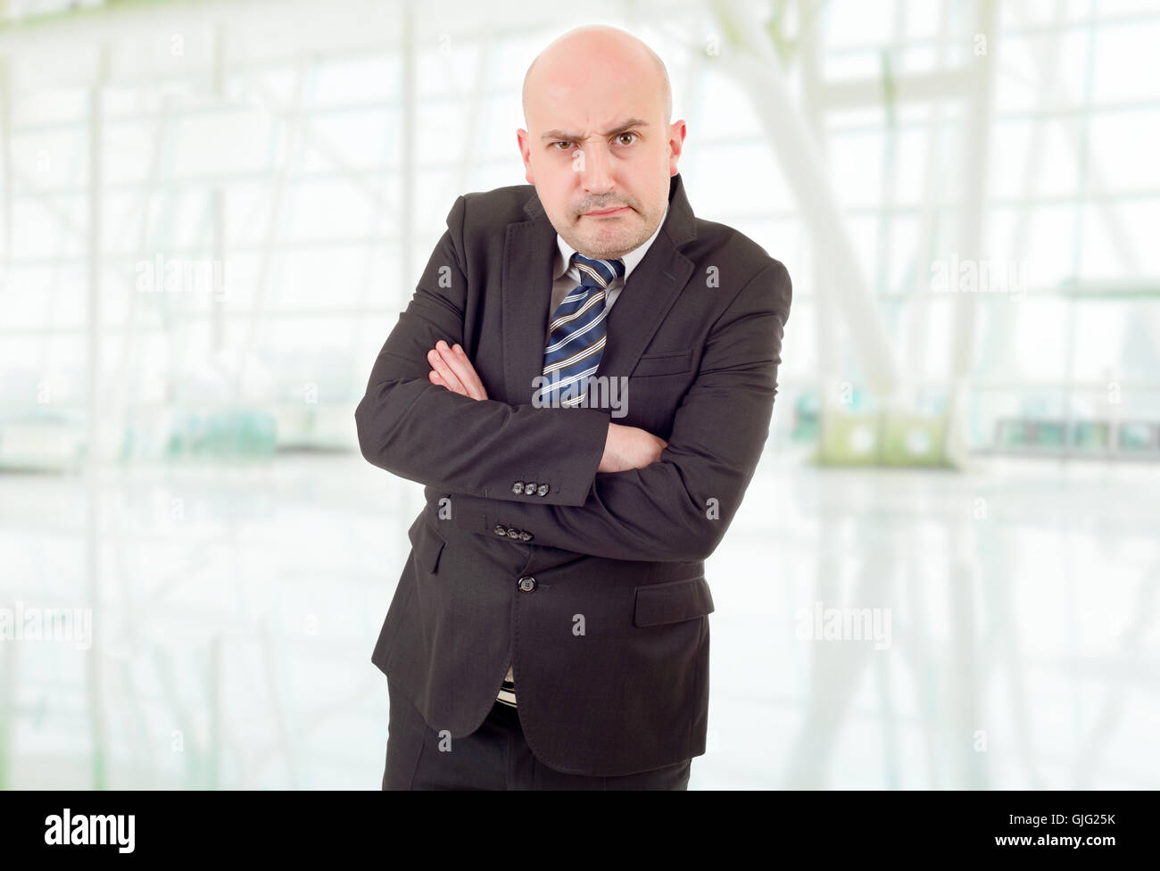 mad businessman portrait at the office Stock Photo - Alamy