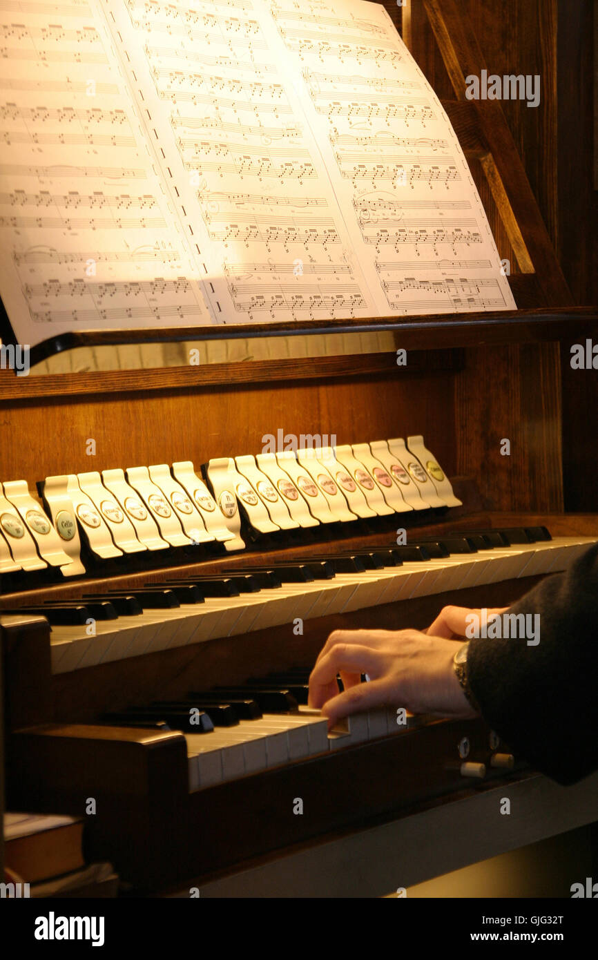 Organ player hi-res stock photography and images - Alamy