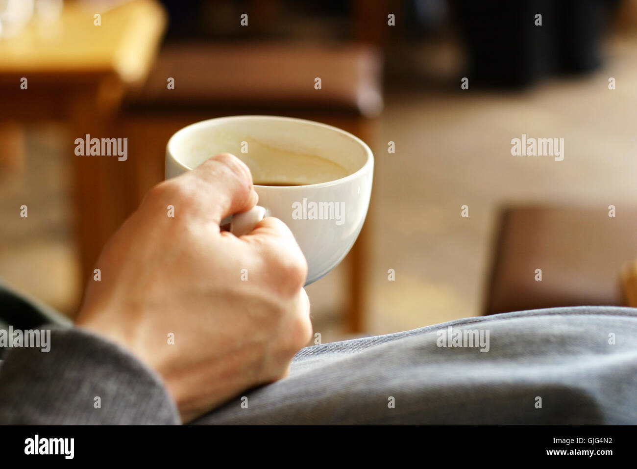 cup hand finger Stock Photo - Alamy