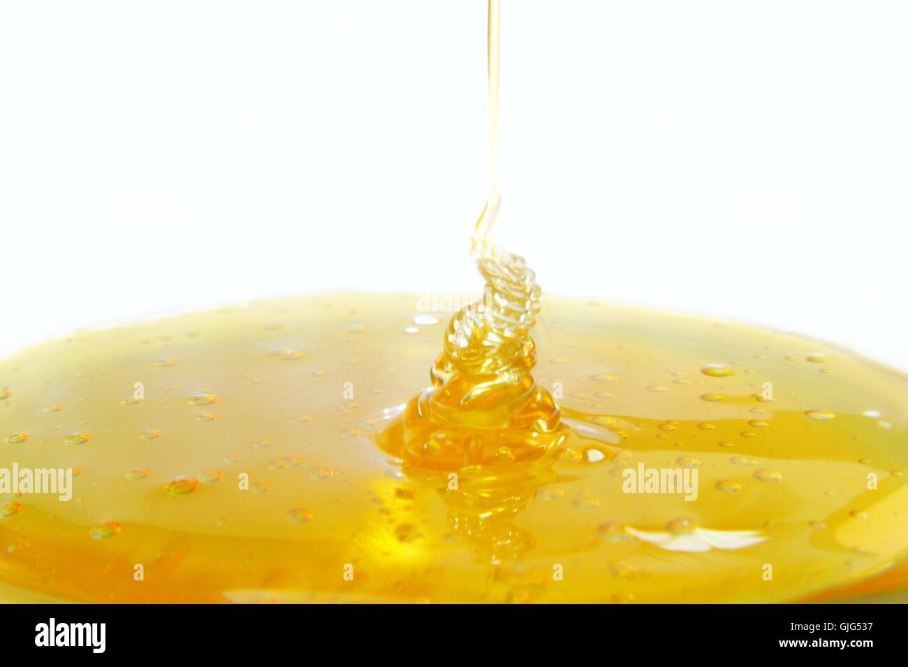 liquid nectar golden Stock Photo - Alamy
