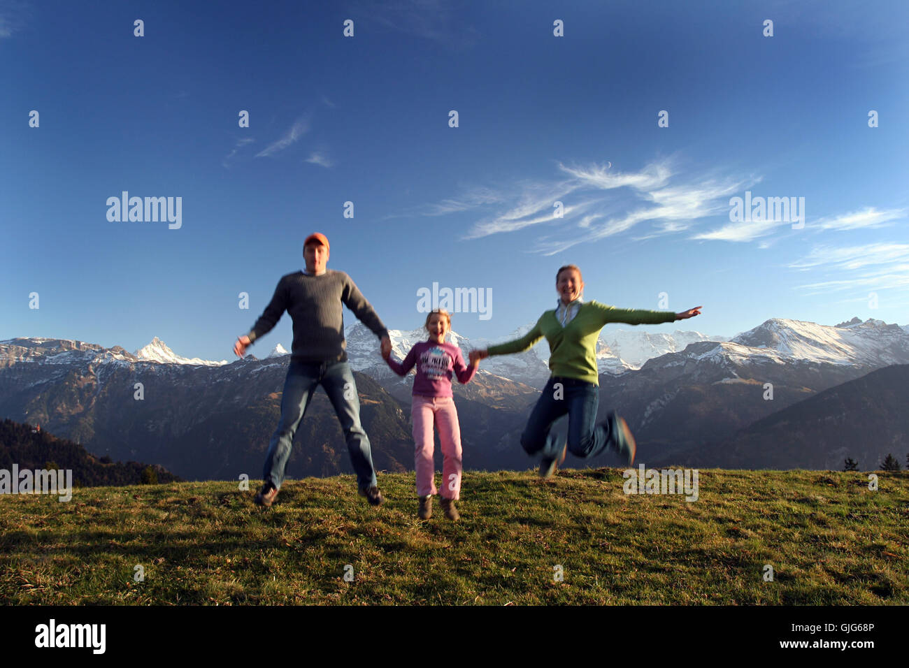 funny family jump Stock Photo - Alamy