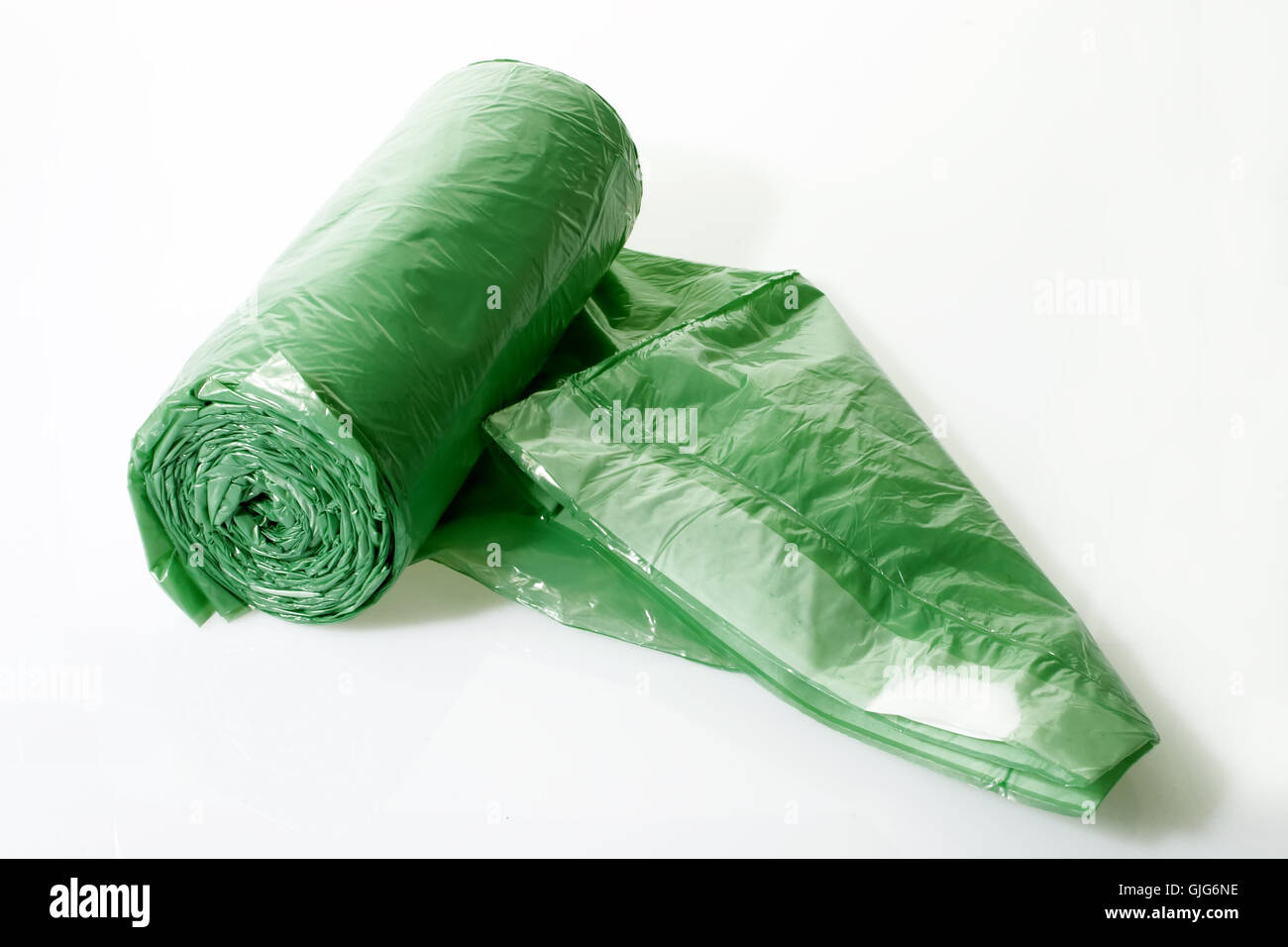 green trash plastic Stock Photo - Alamy