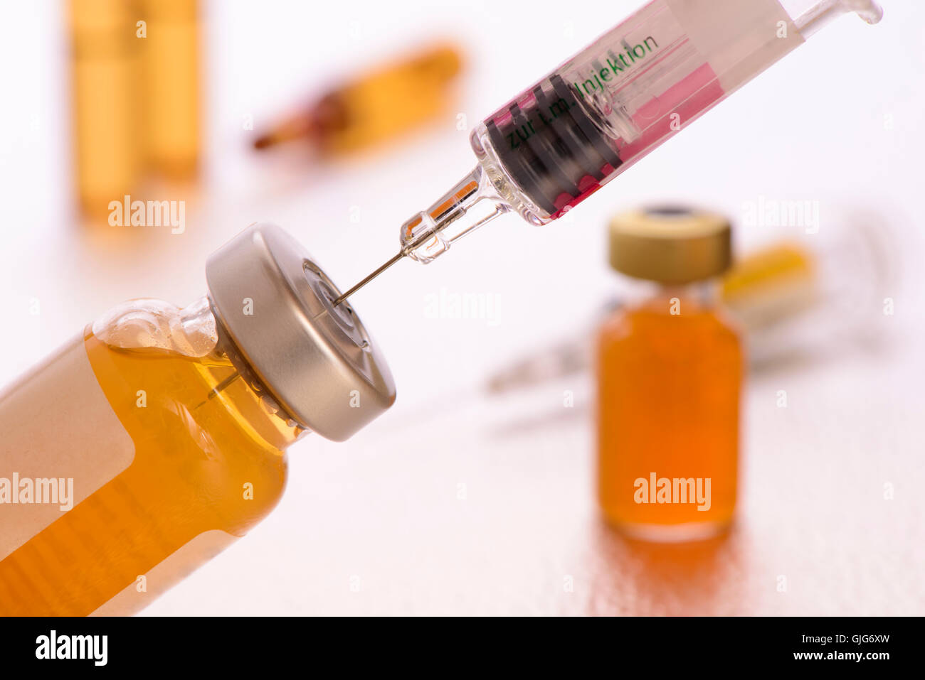 injection with syringe in medical laboratory Stock Photo - Alamy
