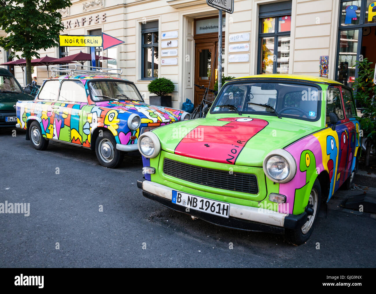Two old Trabants with psychedelic paint jobs, outside Noir Berlin ...