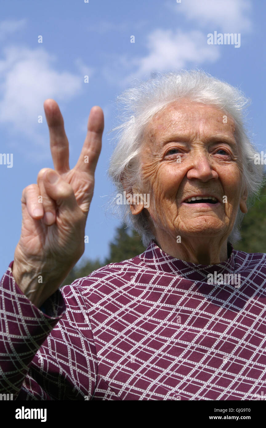 woman sign signal Stock Photo - Alamy