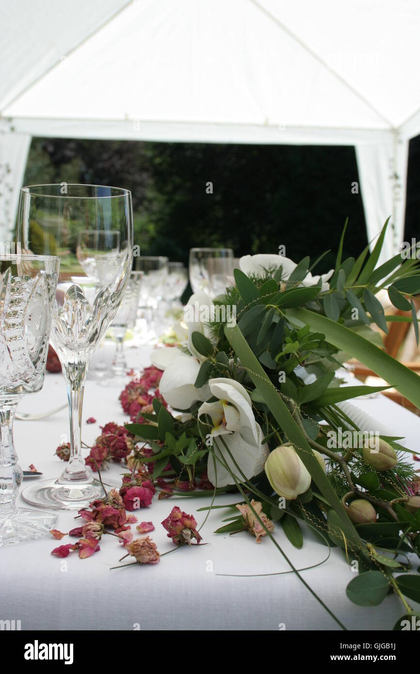 covered table in the garden Stock Photo - Alamy