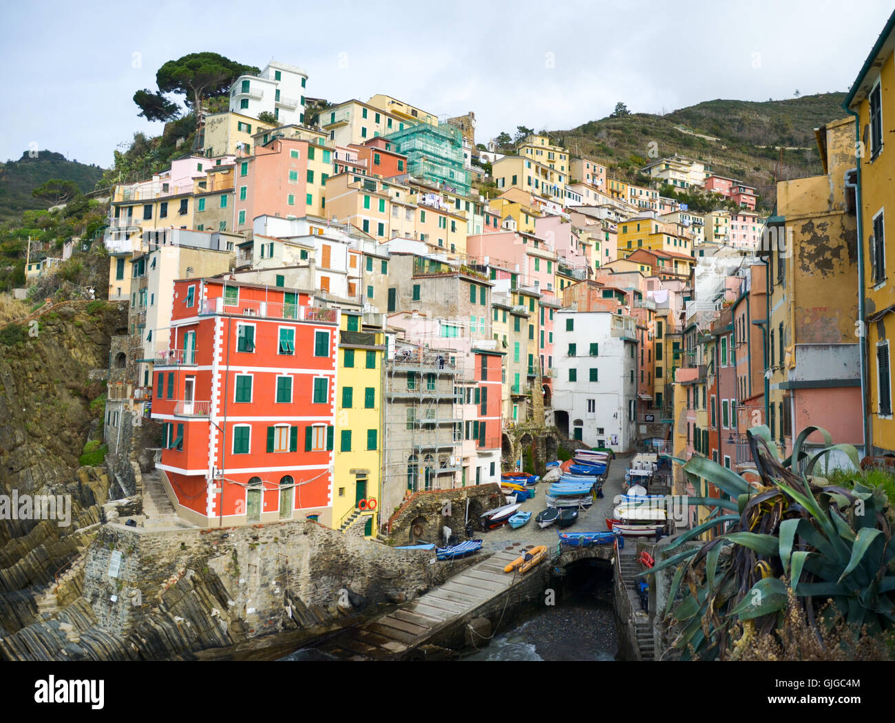 Panoramic view of Riomaggiore, one of five famous colorful villages of Cinque Terre, La Spezia ...