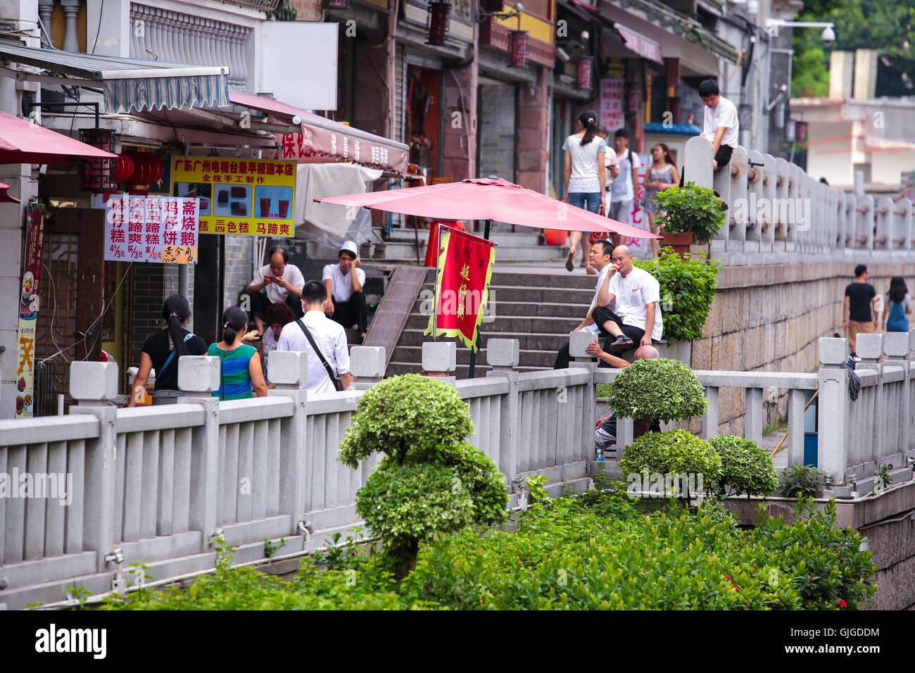 Buildings and hawker stalls around the old Xiguan blocks and Liwan Bay ...