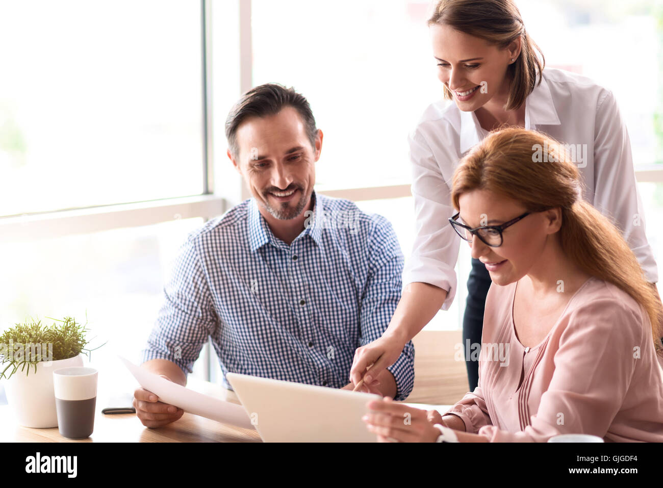 Positive business project manager hi-res stock photography and images ...