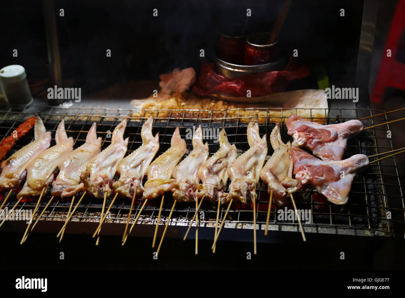 Stall selling barbecue chicken wing hi-res stock photography and images ...