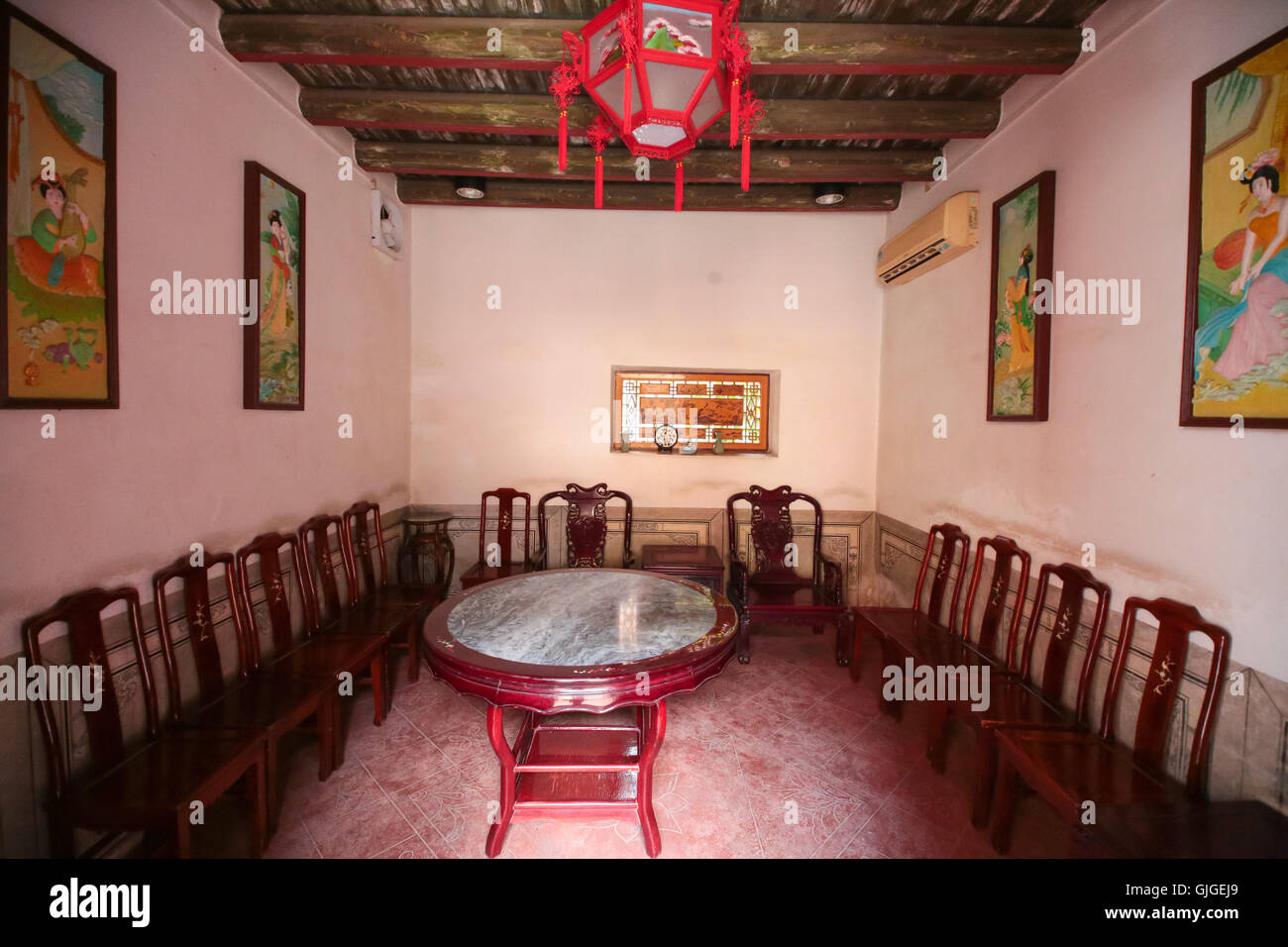 Living room of a Hakka round house restaurant at Meizhou, Guangdong ...