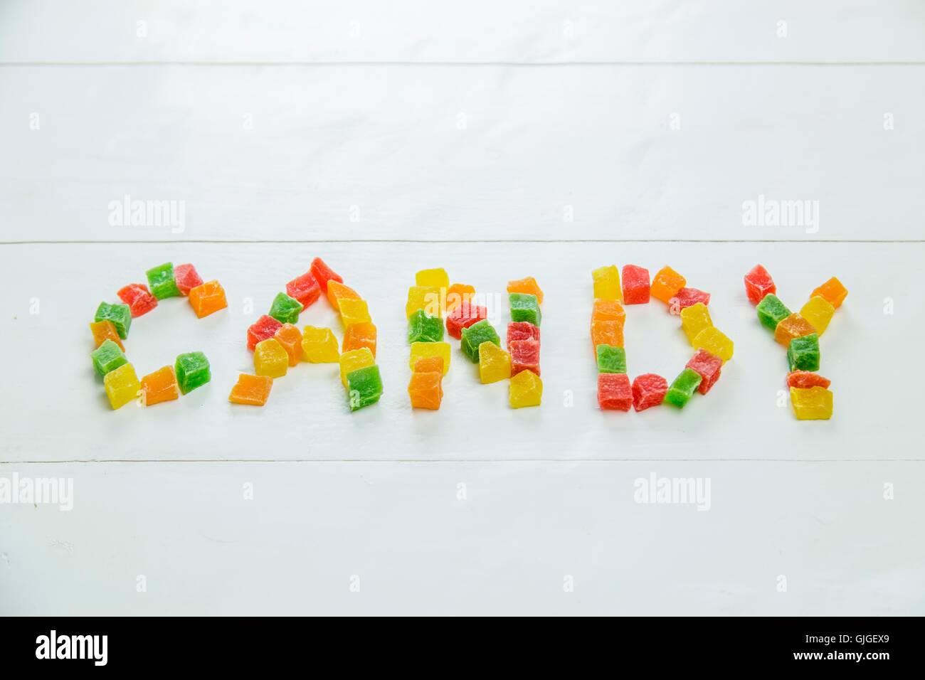 Word candy written with dried pineapples Stock Photo - Alamy