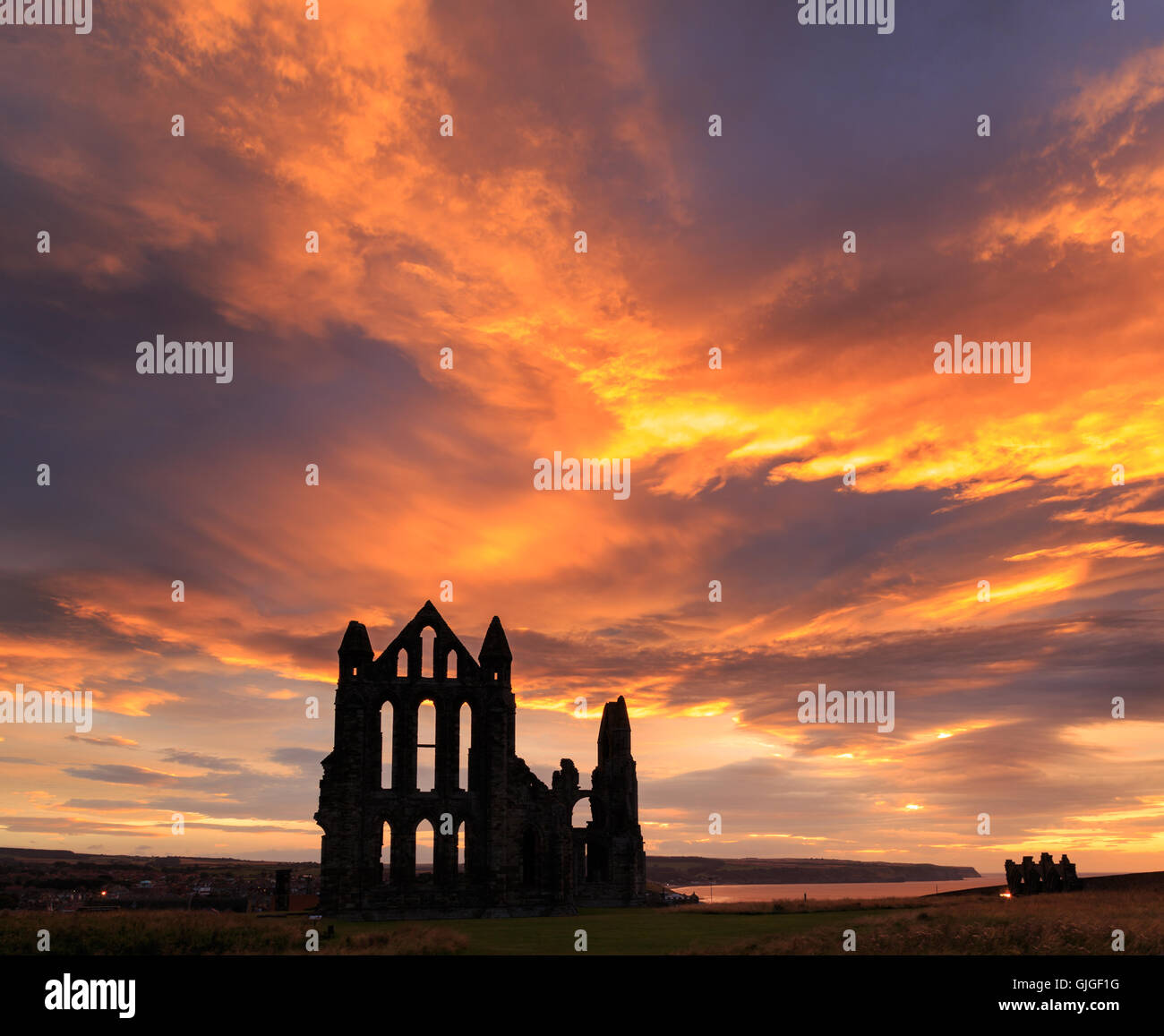 Whitby Abbey against a dramatic sunset. In Whitby, North Yorkshire ...