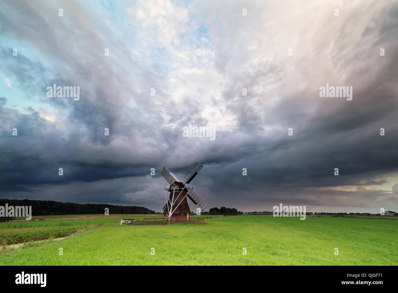 Windmill with rain clouds hi-res stock photography and images - Alamy