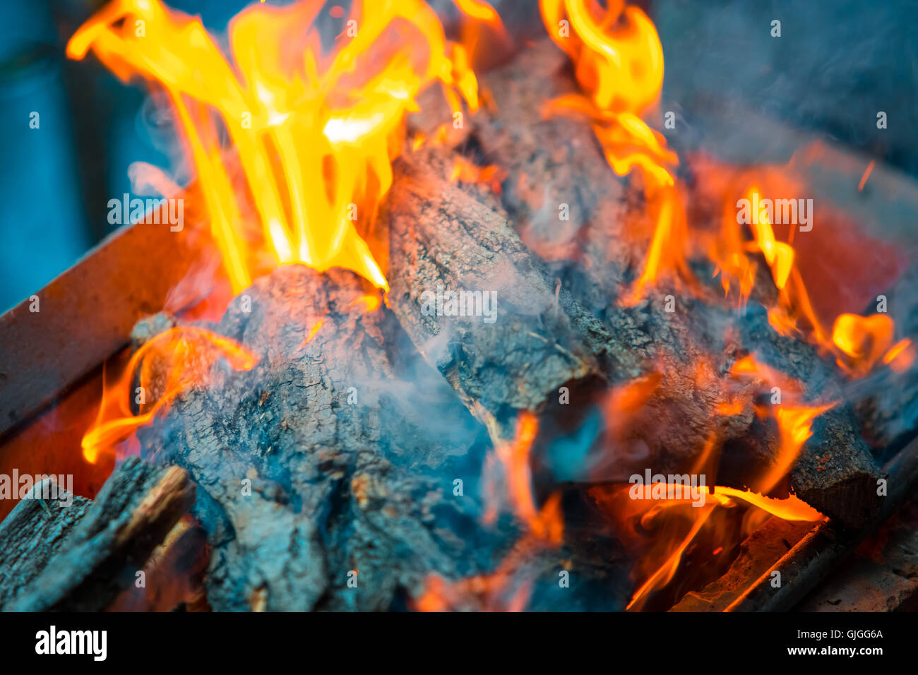 Beautiful burning fire flame background with smoke Stock Photo - Alamy