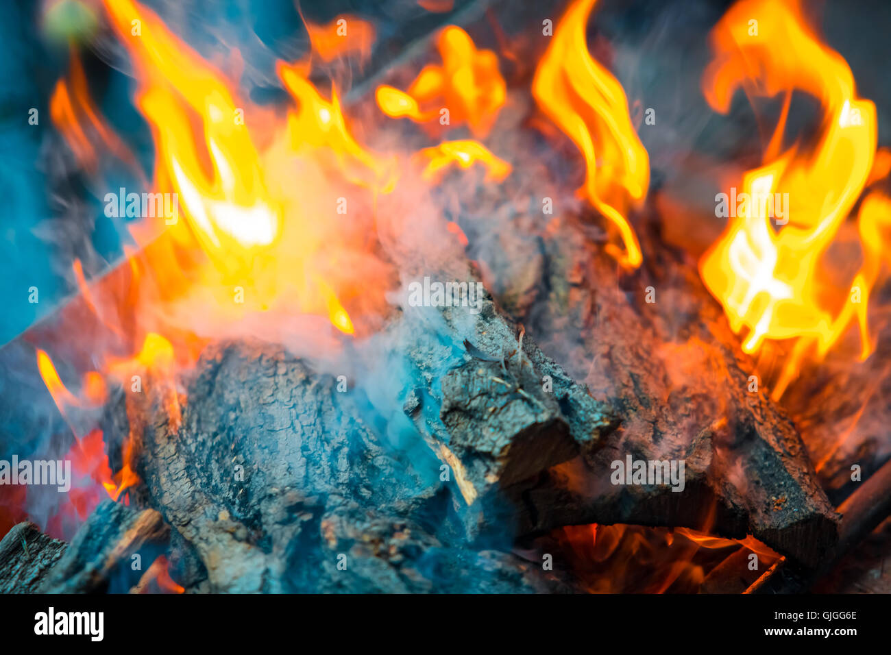 Beautiful burning fire flame background with smoke Stock Photo - Alamy