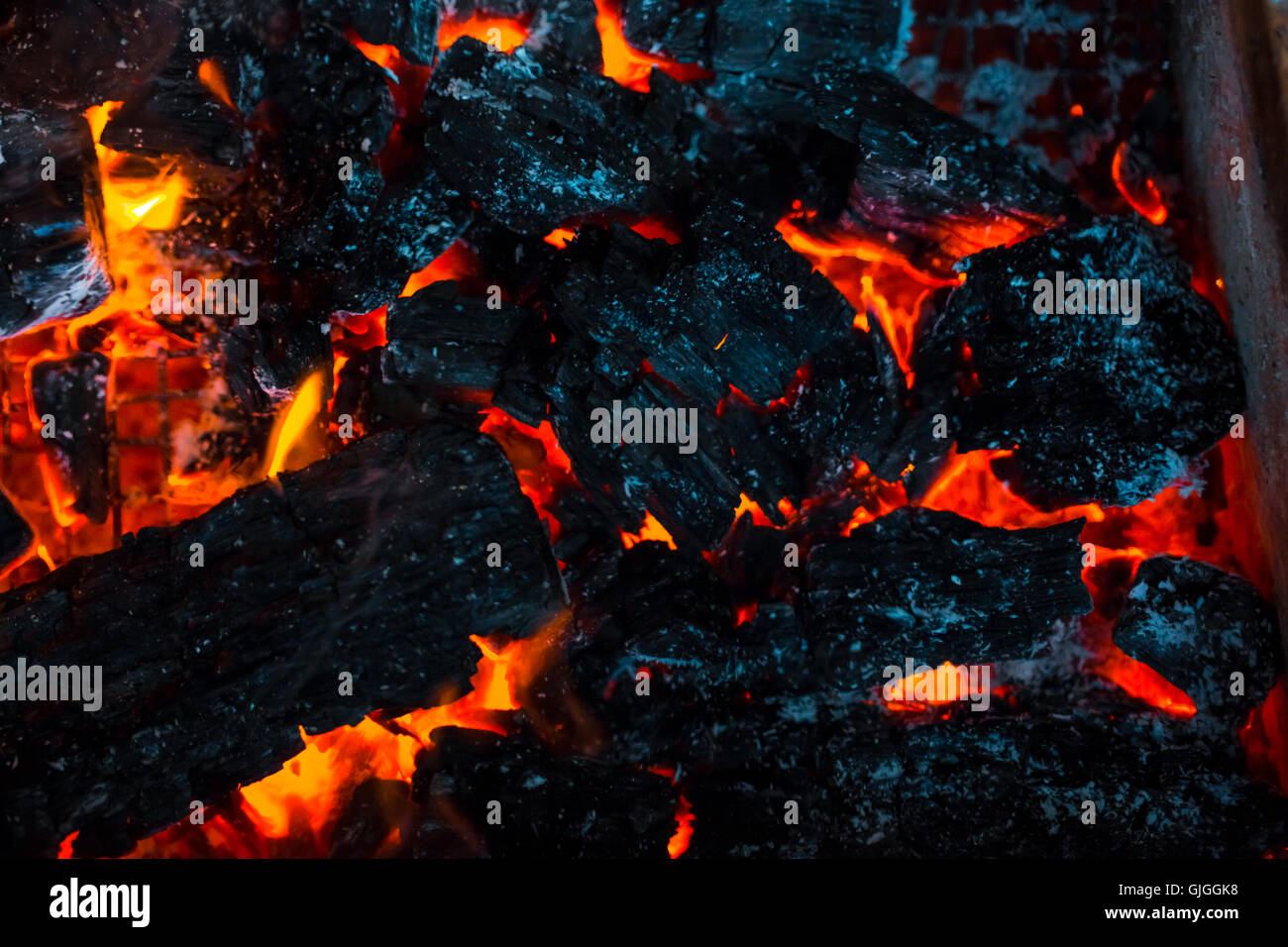 Beautiful burning fire flame background and coals Stock Photo - Alamy