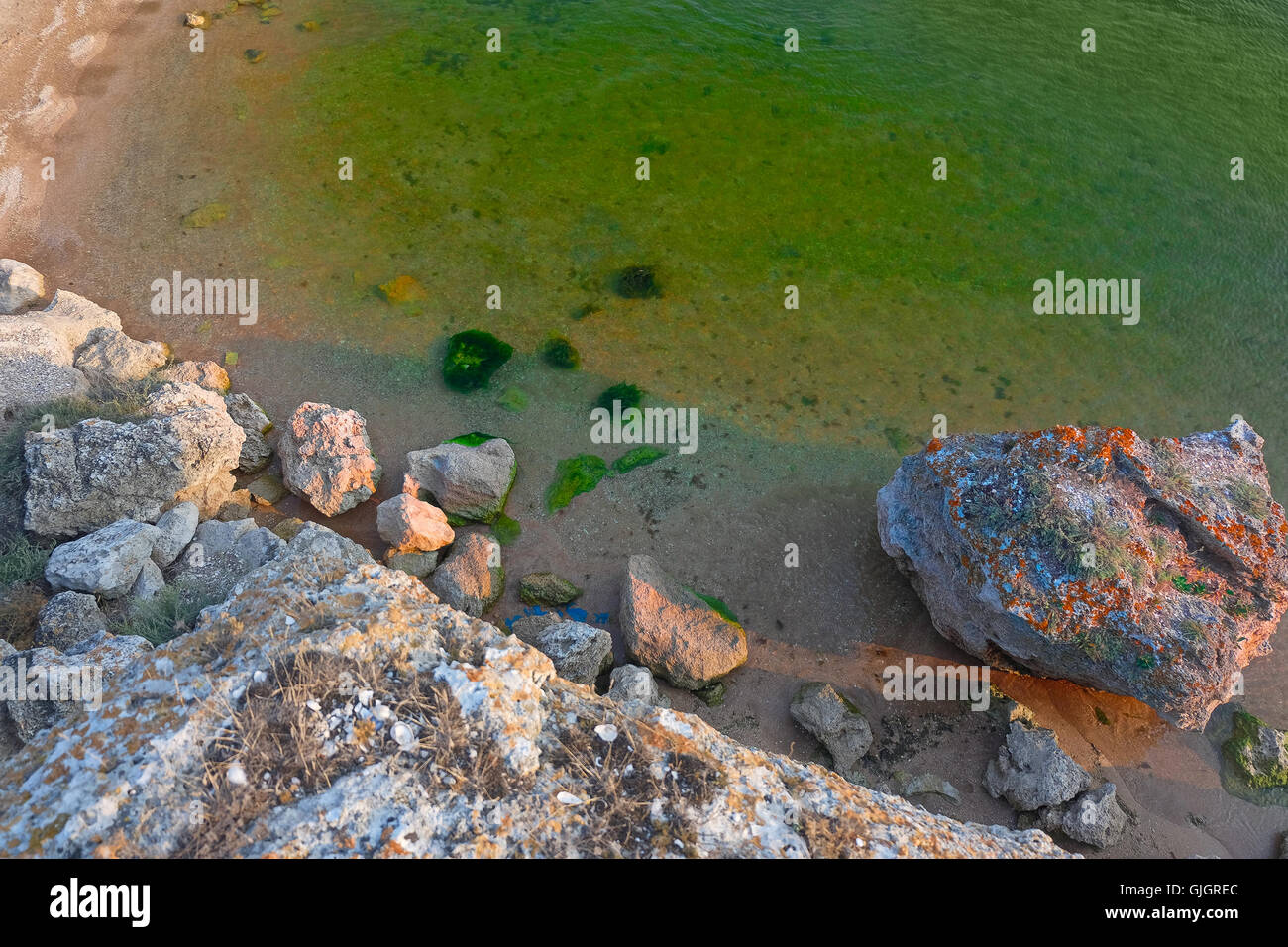 Rocks in the sea viewed from above Stock Photo - Alamy