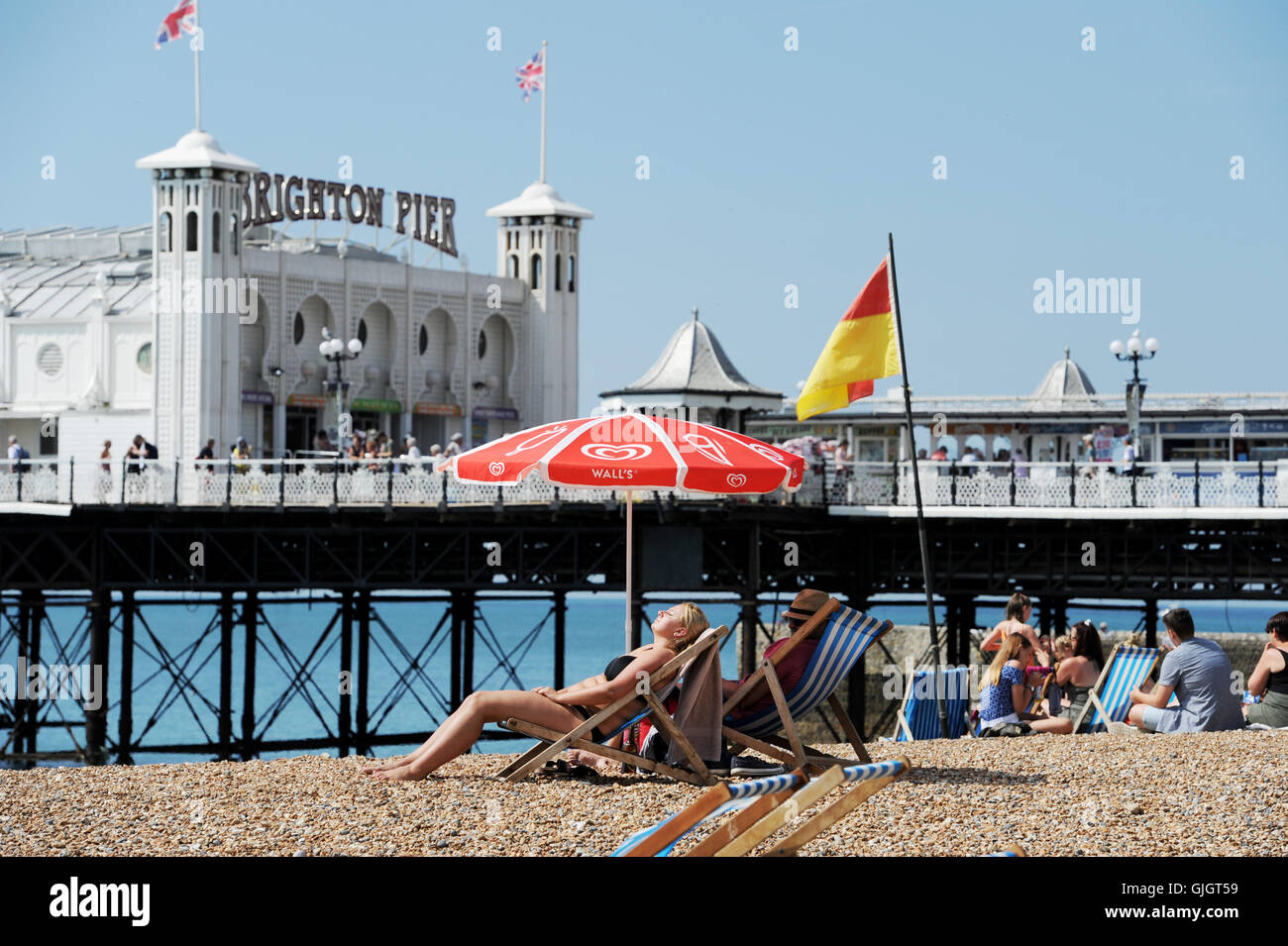 Brighton UK 16th August 2016 - People enjoy the sunshine on Brighton ...