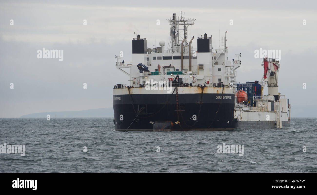 The special ship 'Cable Enterprise' laying a 25 kilometer long cable ...